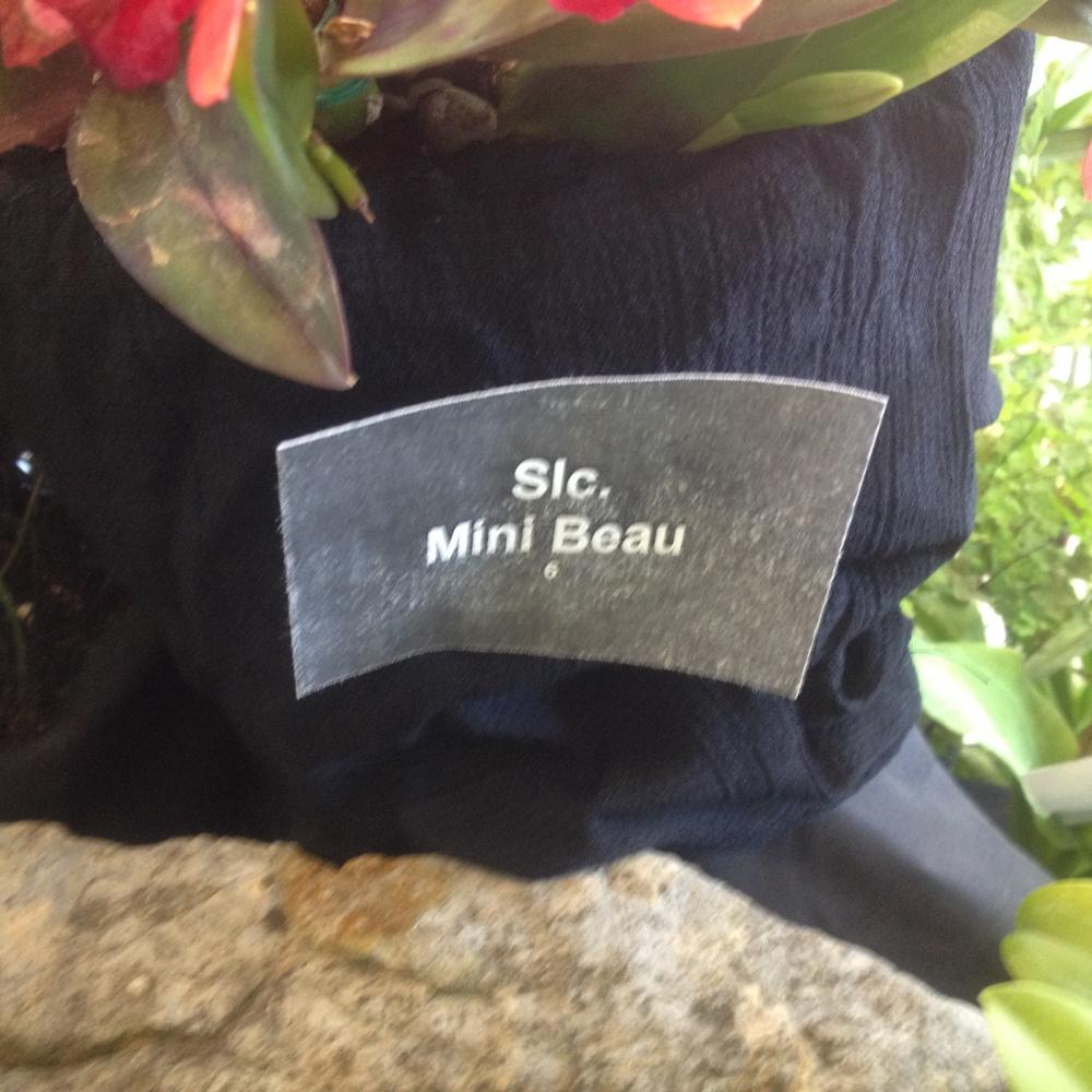 Slc. Mini Beau in the Plant Database forum - Garden.org